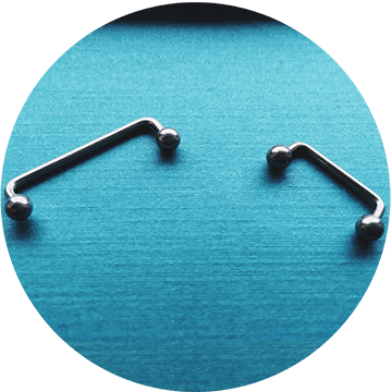 Surface Piercings - Almost Famous Body Piercing